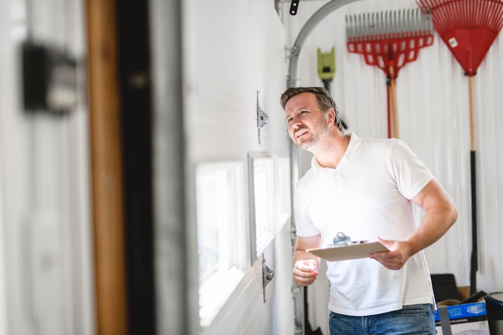 Signs You Need a Garage Door Pro vs DIY Fixes | Door Pro America